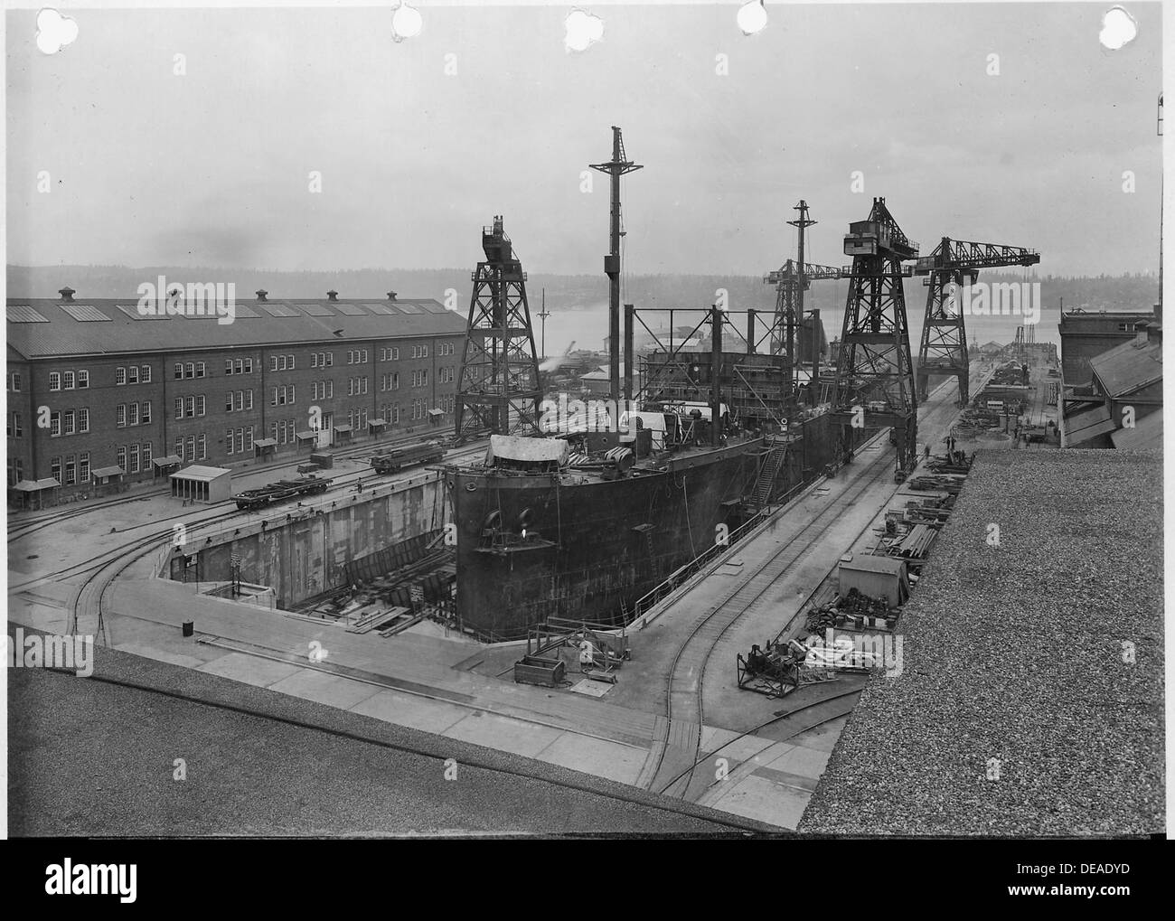 A general view of a shipbuilding dock with ammunition ships under ...