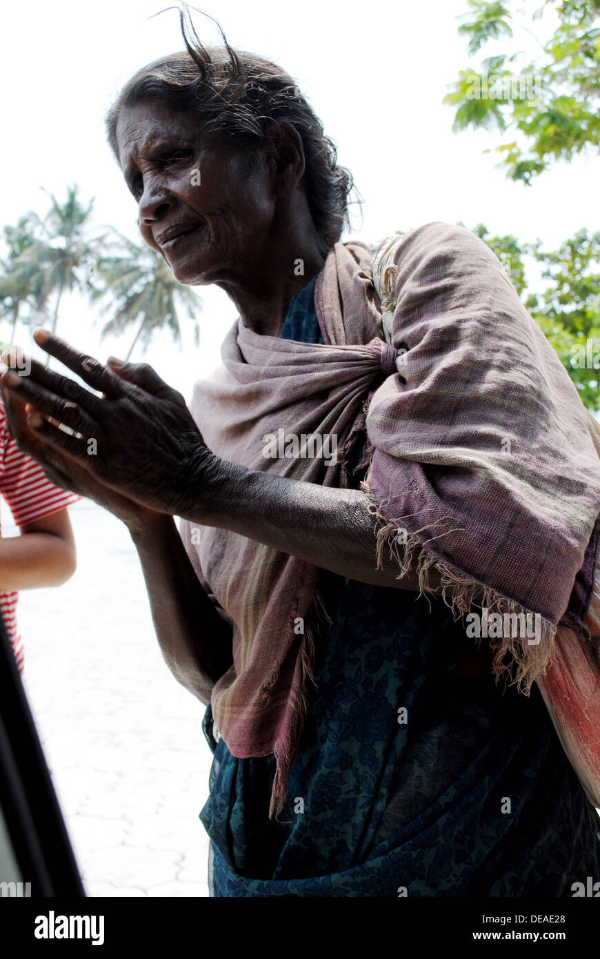 An old lady begging for money Stock Photo - Alamy