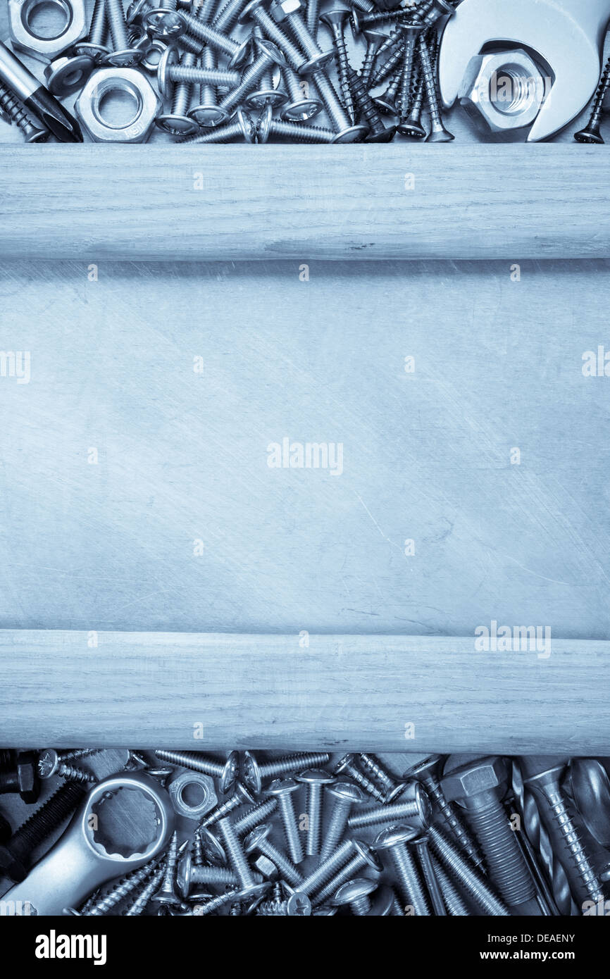 metal construction hardware tool on metal texture Stock Photo - Alamy