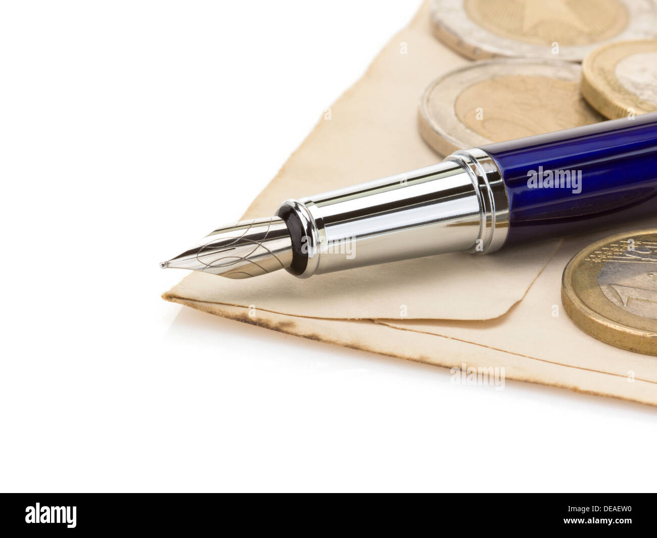 pen at old paper isolated on white background Stock Photo - Alamy