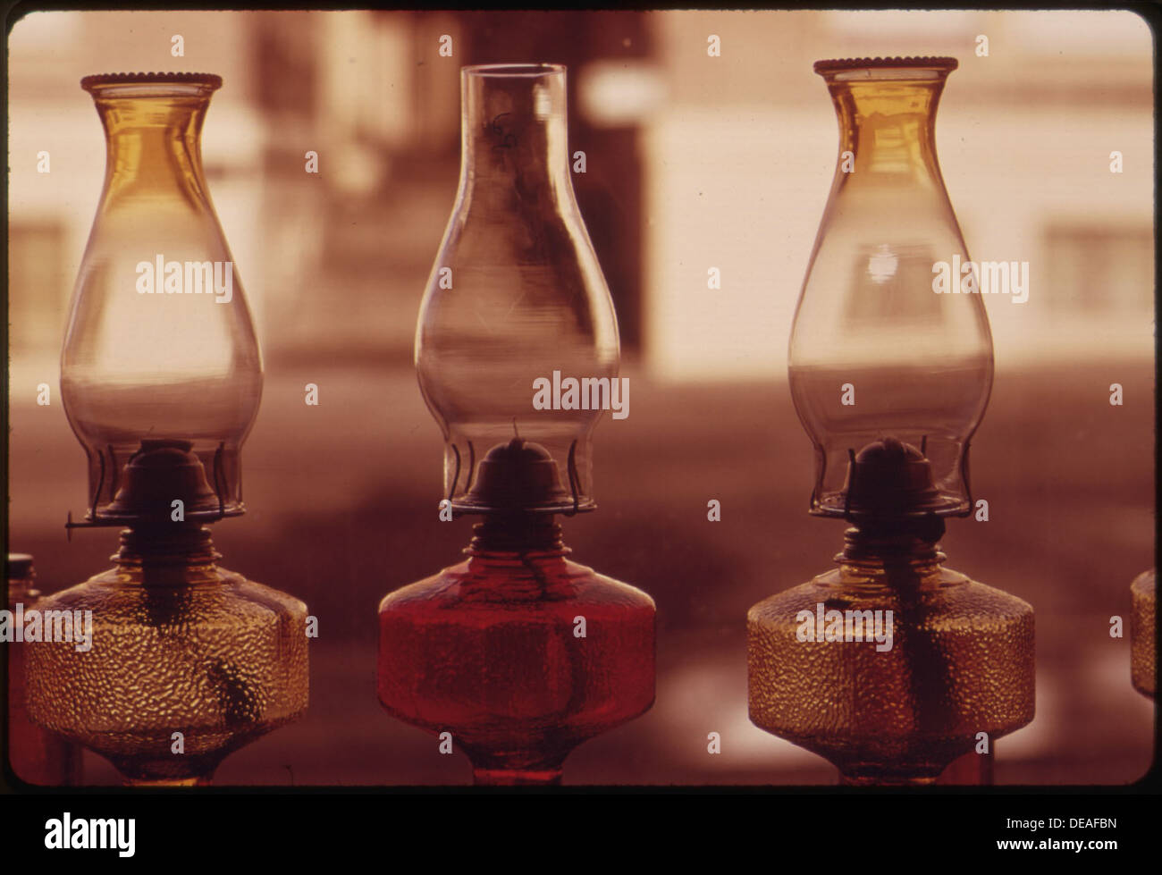 Kerosene lamps, displayed in a business window, became best-sellers ...