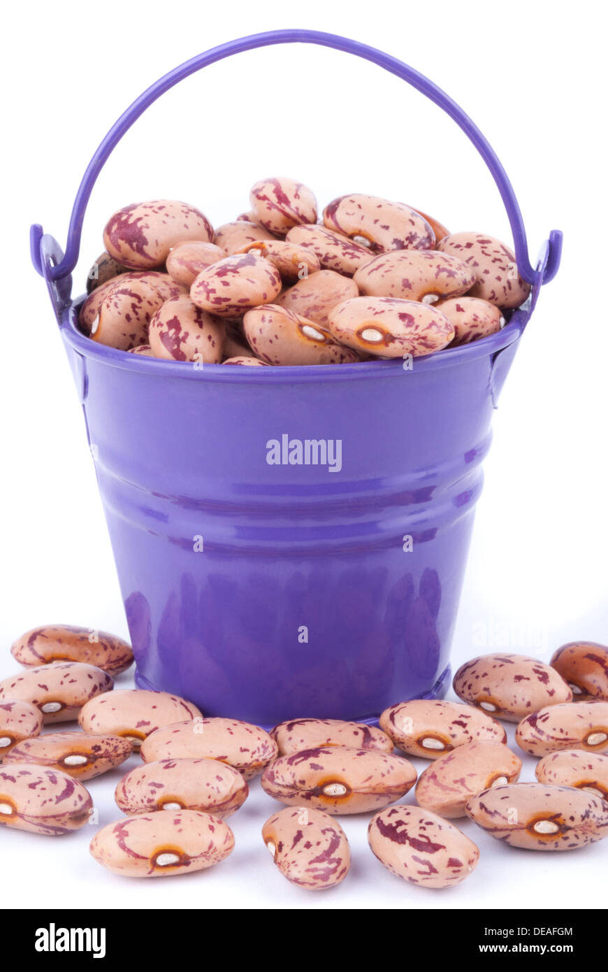 Pail with beans on a white background Stock Photo - Alamy