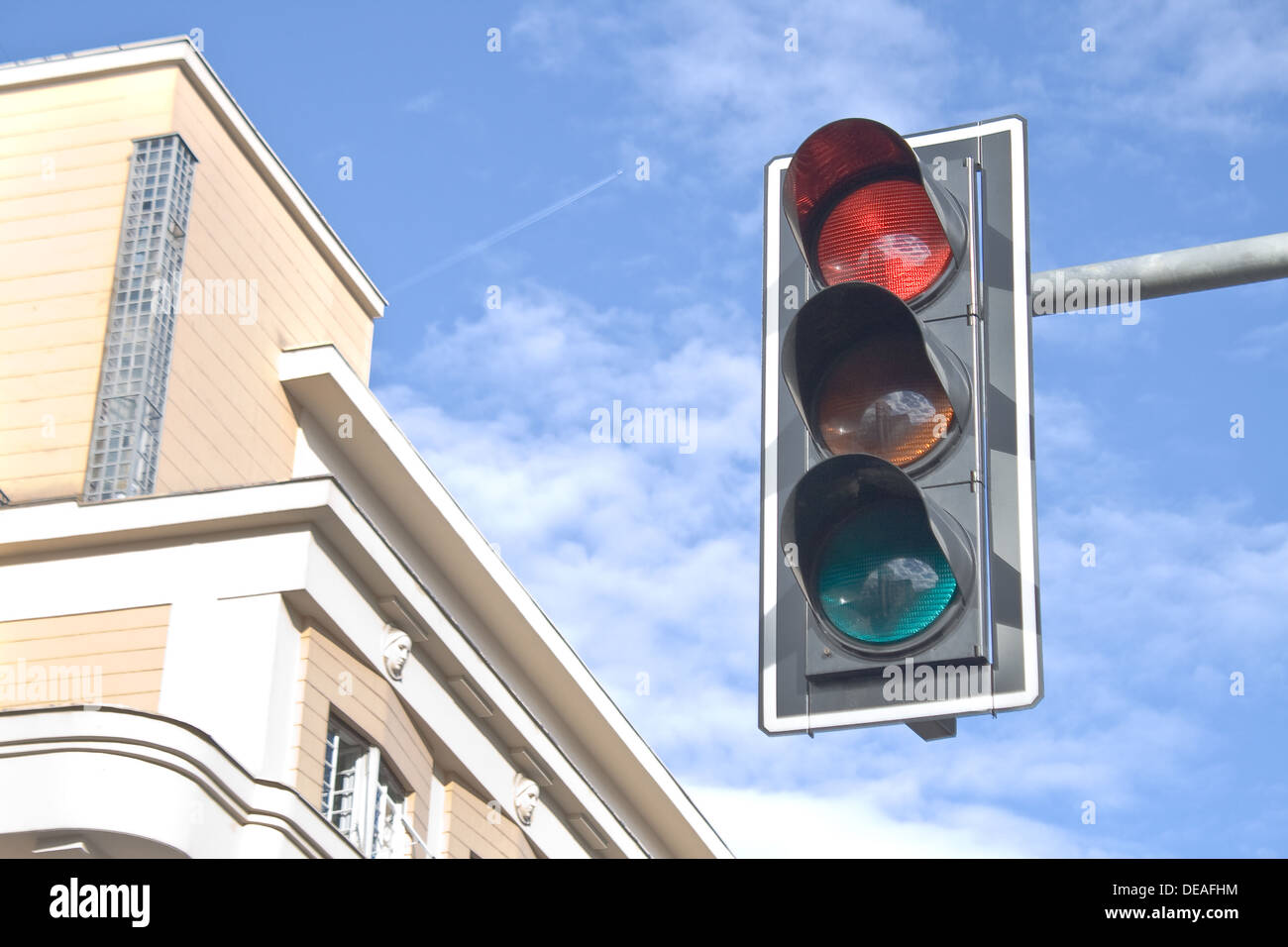 Traffic lights against sky backgrounds Stock Photo - Alamy