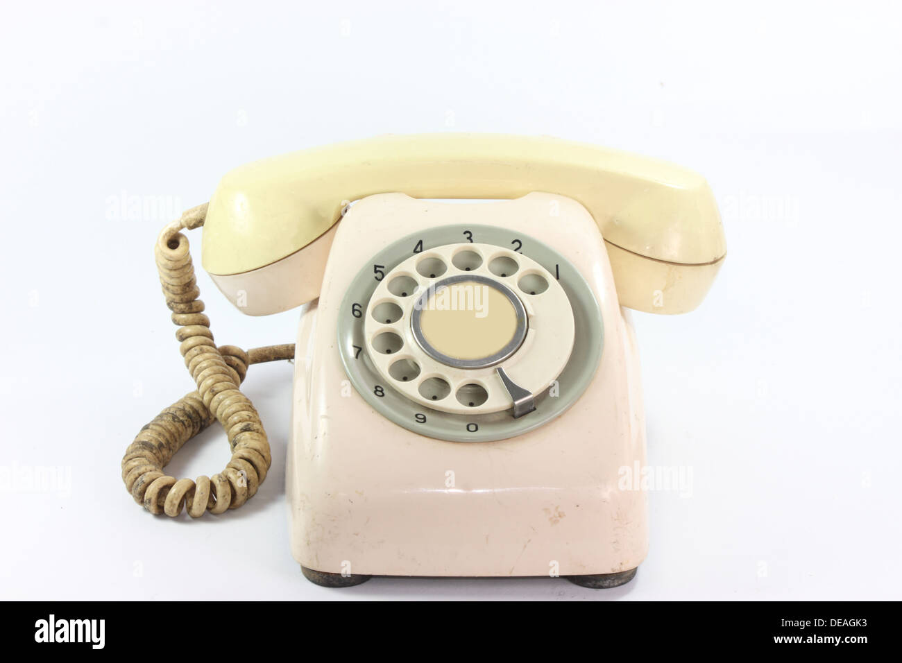 An old telephone dial isolated on white Stock Photo - Alamy
