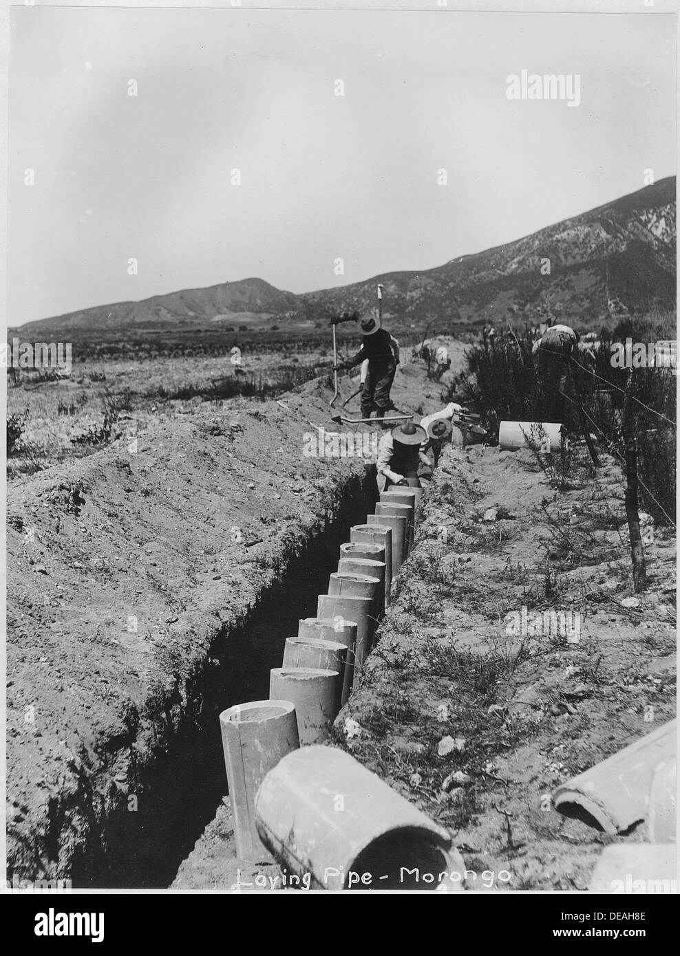 Lay pipe Black and White Stock Photos & Images - Alamy