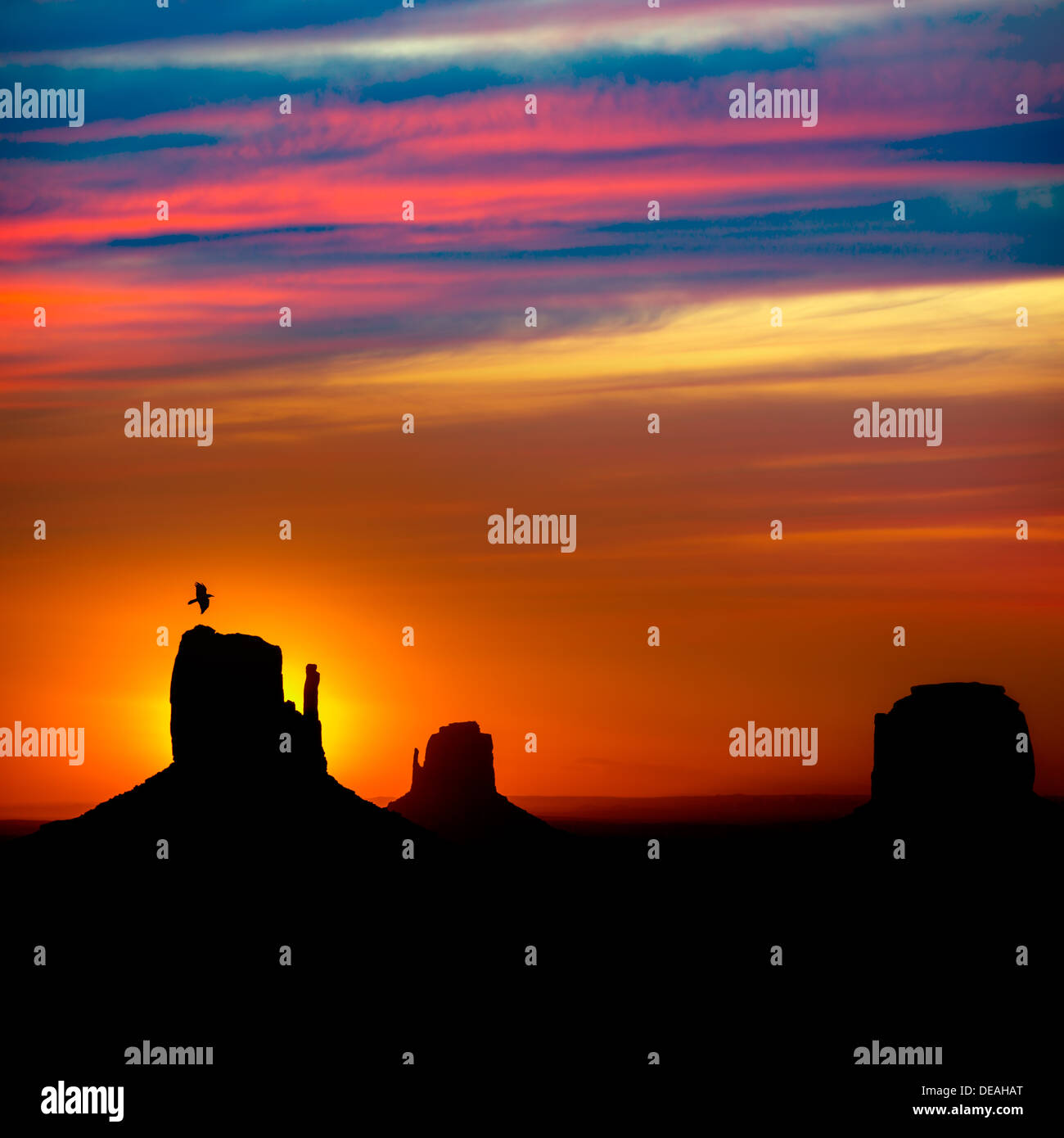 Sunrise at Monument Valley West and East Mittens and Merrick Butte with ...