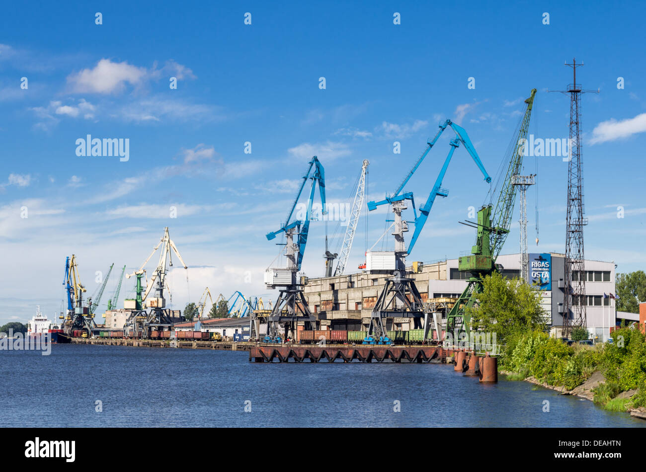 A view of the old cargo port in Riga, Latvia. With soviet era buildings ...