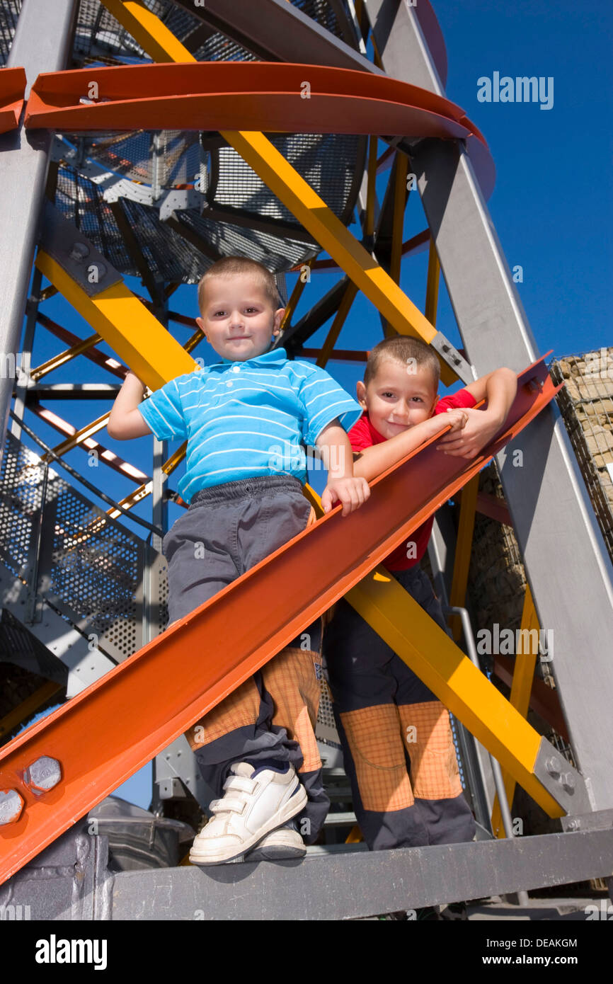 Boys, 6 and 4 years, on a lookout tower Stock Photo - Alamy