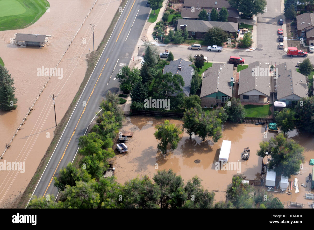 Aerial view of roads washed out and neighborhoods under water following ...