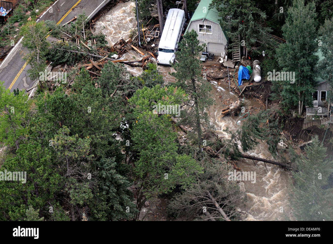 Aerial view of roads washed out and neighborhoods under water following ...