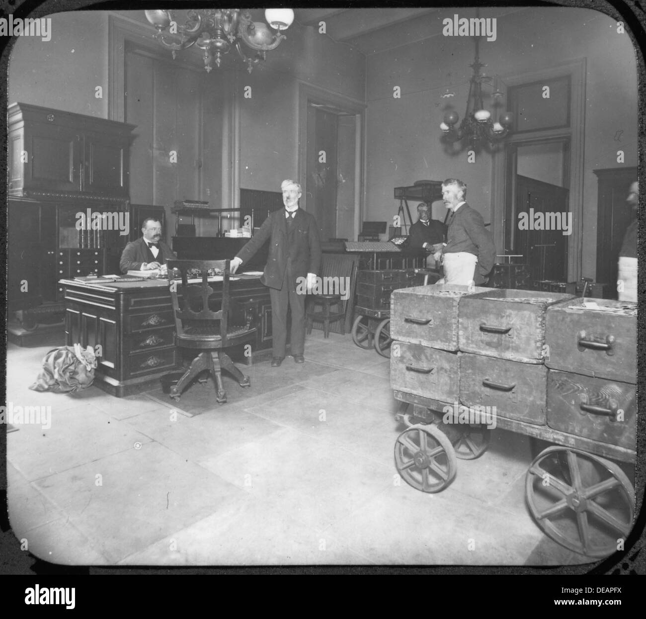 Photograph of five San Francisco Mint employees in the Coiner's Office ...