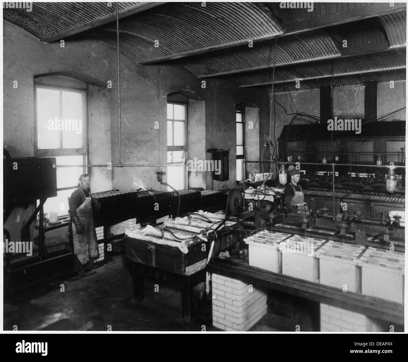 Photograph of two San Francisco Mint employees in the electrolytic ...