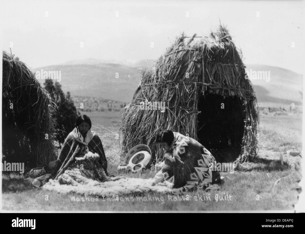 This photograph depicts members of the Washoe tribe working together to ...