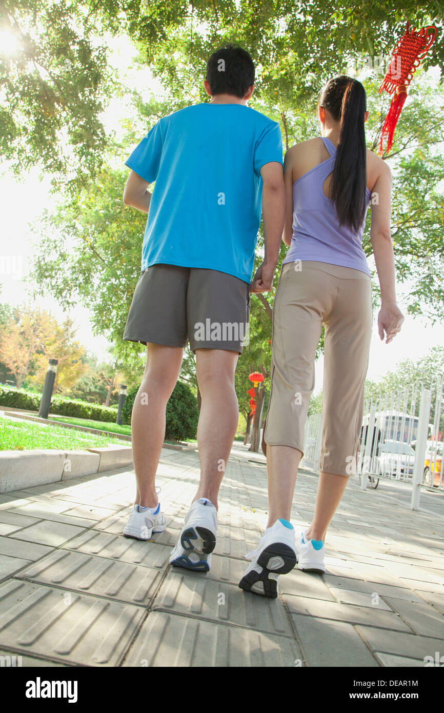Young Couple Walking Together Stock Photo - Alamy
