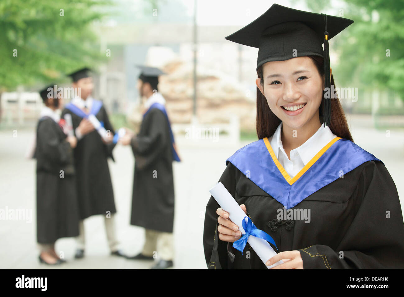Young Female University Graduate, Portrait with Diploma Stock Photo - Alamy