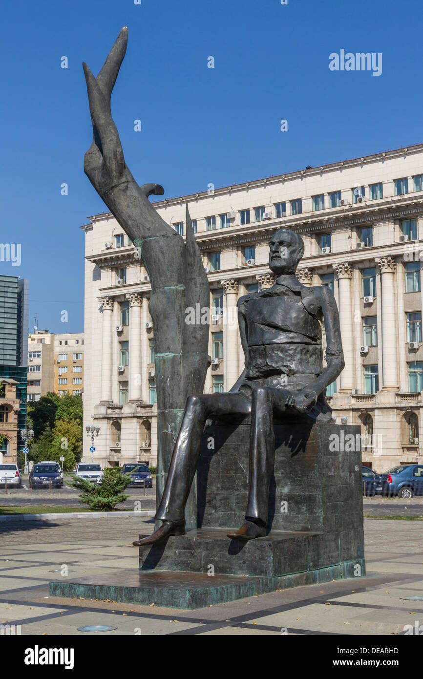 Romania Bucharest, Piata Revolutiei, statue of man broken but put ...