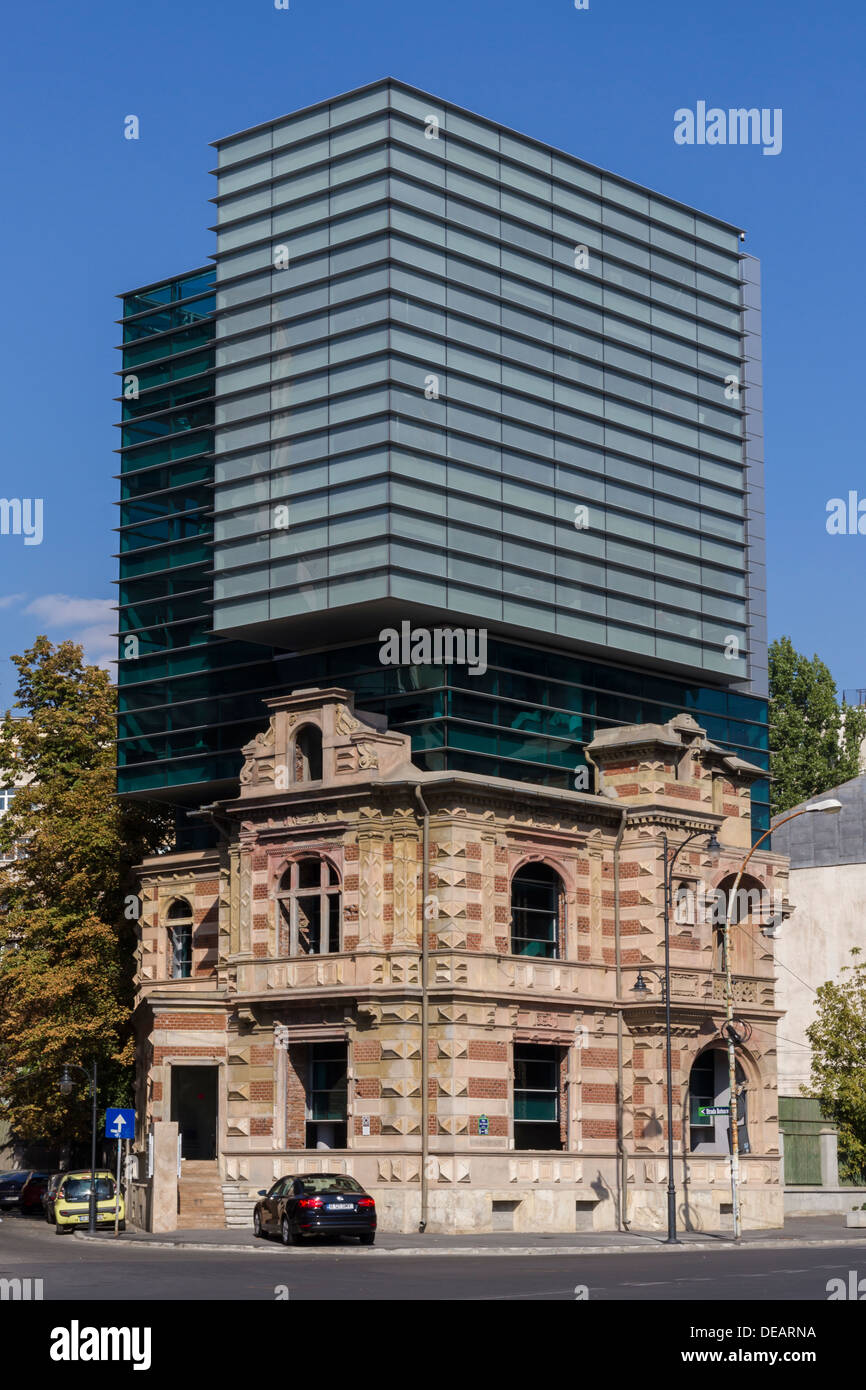 Romania Bucharest, shell of old Securitate building topped by new ...