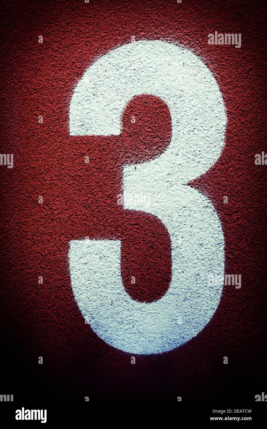 Track and field number three Stock Photo - Alamy