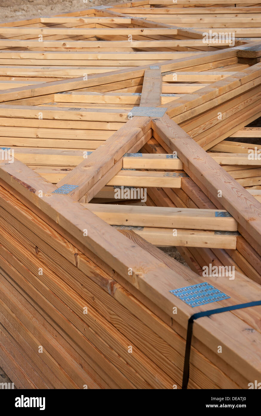 Pre-fab and cut lumber pile for easy set-up Stock Photo - Alamy