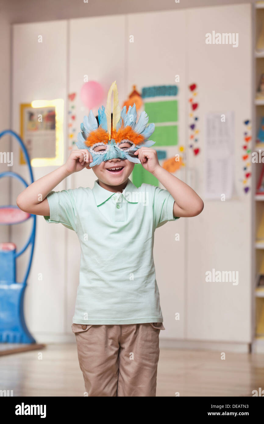 Boy wearing face mask holding hi-res stock photography and images - Alamy