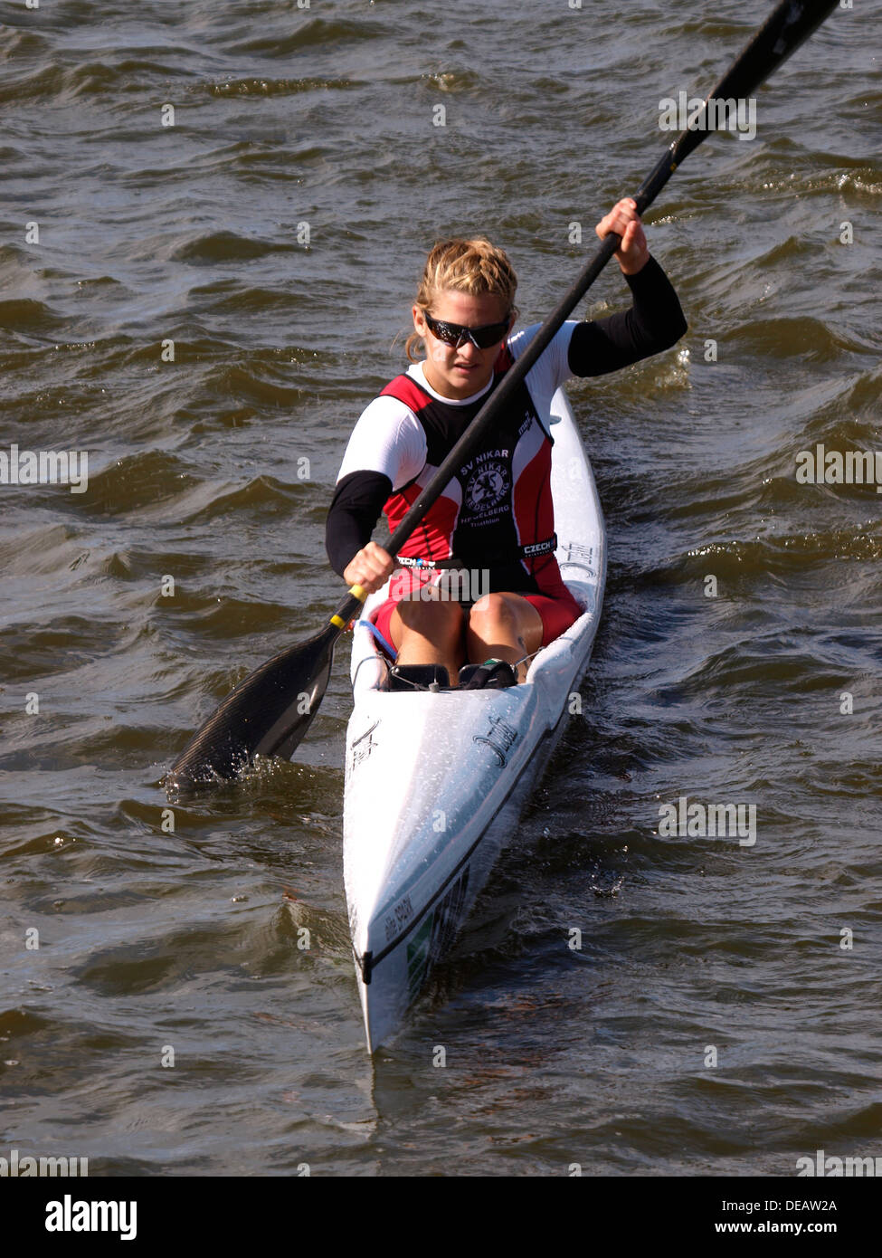 Female Canoeist during race, Bude, Cornwall, UK 2013 Stock Photo - Alamy