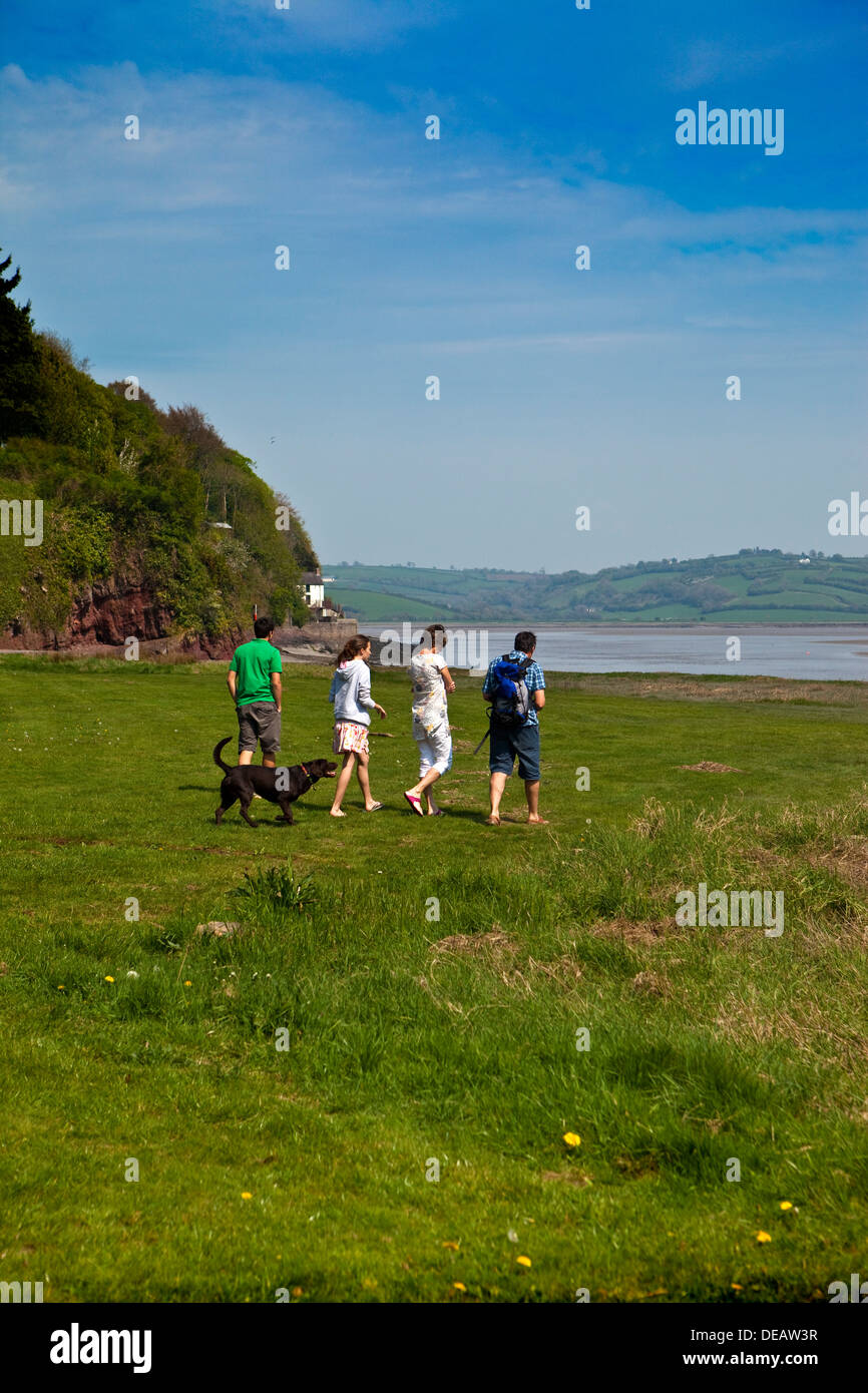 Family walking dog hi-res stock photography and images - Alamy