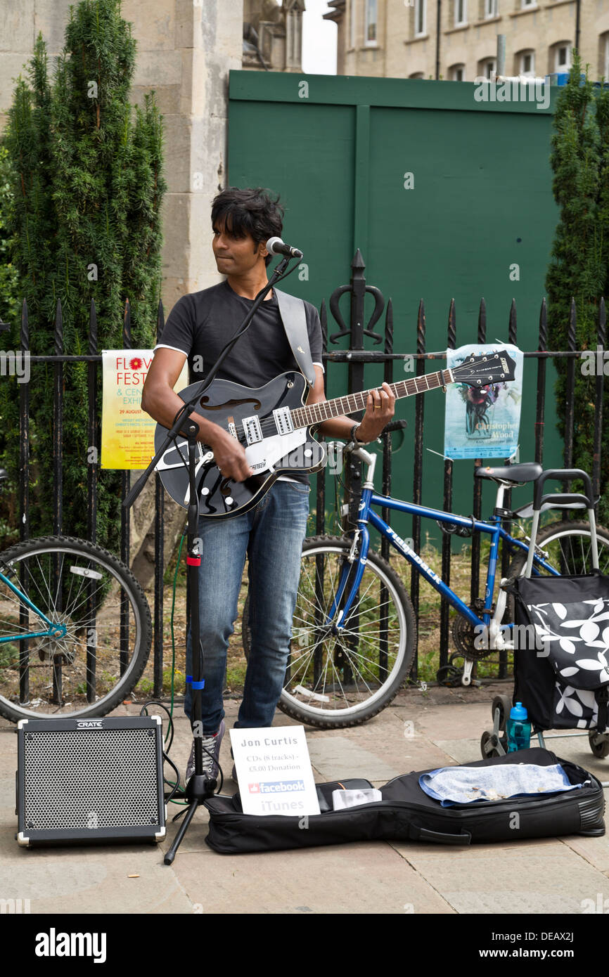 Jon Curtis busker singer performing in Cambridge, England Stock Photo ...