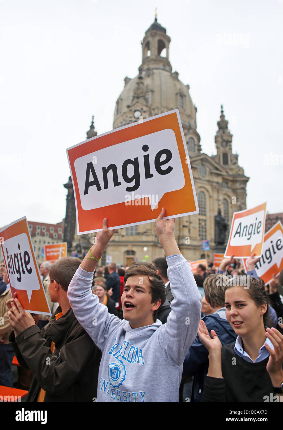 Dresden, Germany. 15th Sep, 2013. Spectators with 'Angie'-signs cheer ...