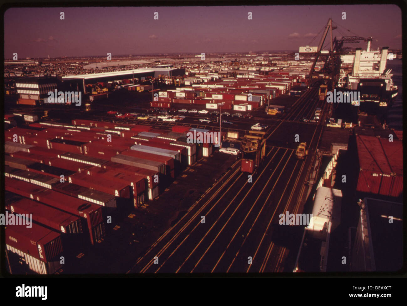 Shipping containers line the docks at the Port of Newark, New Jersey ...