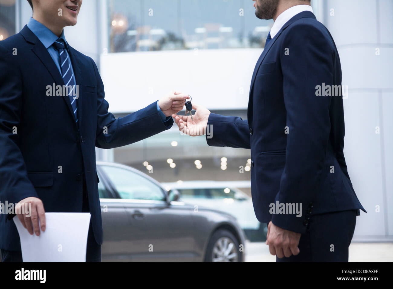 Handing over keys hi-res stock photography and images - Alamy