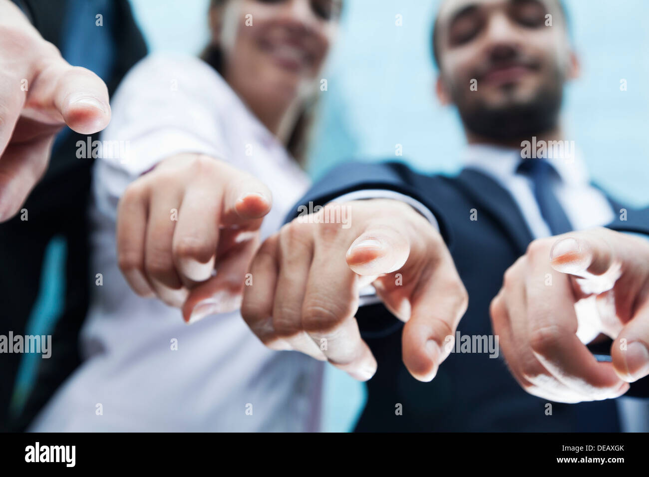 Business group pointing camera hi-res stock photography and images - Alamy