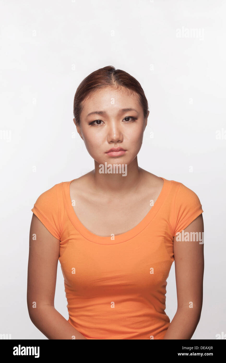 Portrait of serious teenage girl, studio shot Stock Photo - Alamy