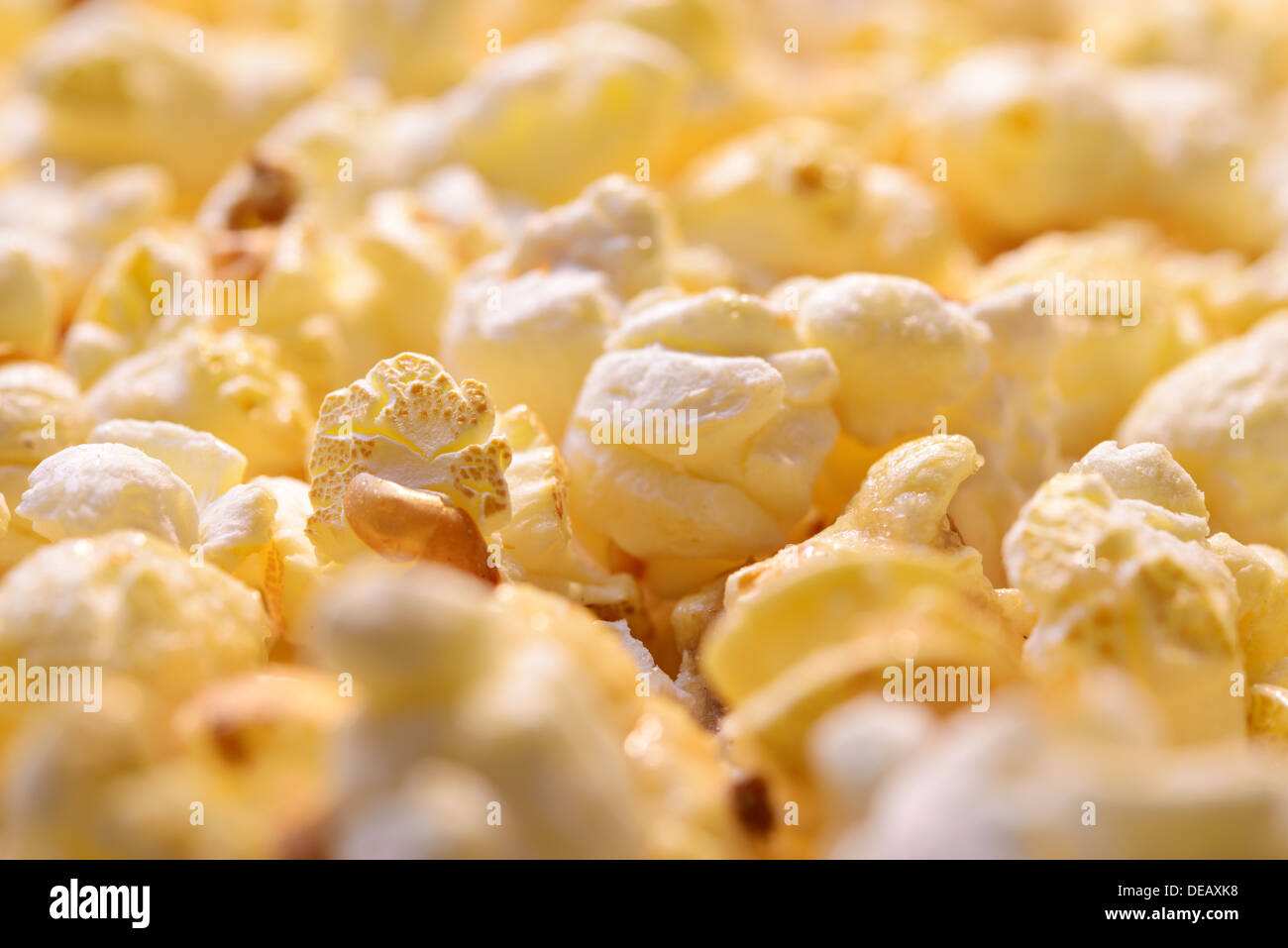 Popcorn close-up, whole background Stock Photo - Alamy