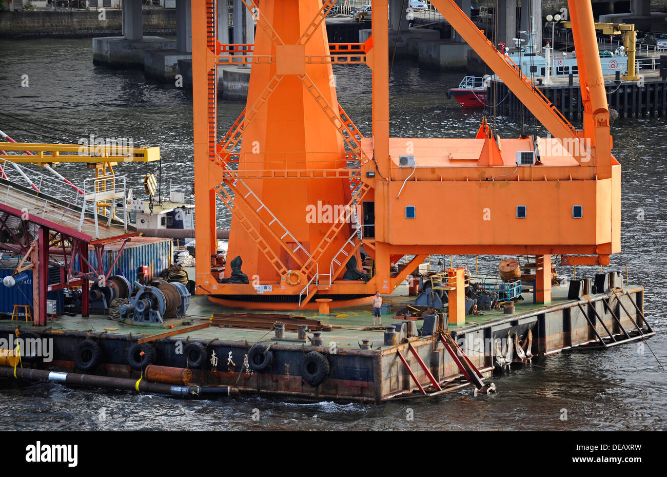 Large crane mounted onto a platform in Hong Kong bay Stock Photo - Alamy