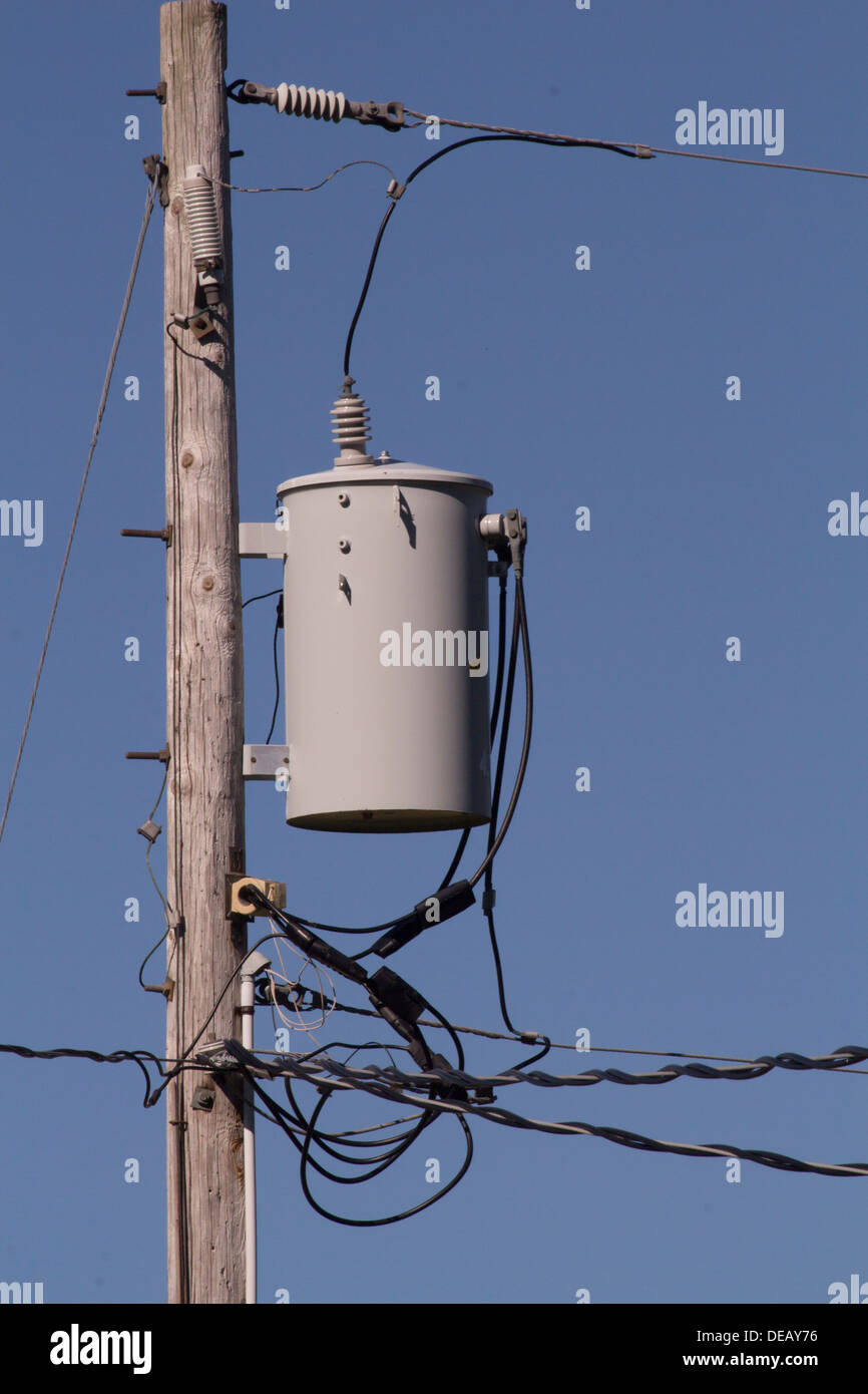 Hydro transformer on farm on pole with lots of cables Stock Photo - Alamy