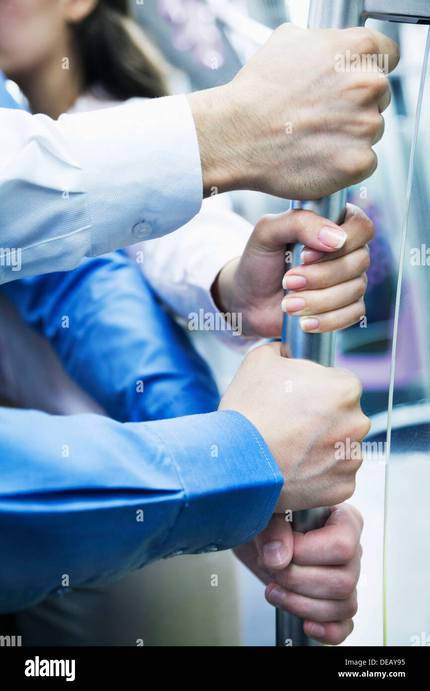 Close up hand holding pole hi-res stock photography and images - Alamy