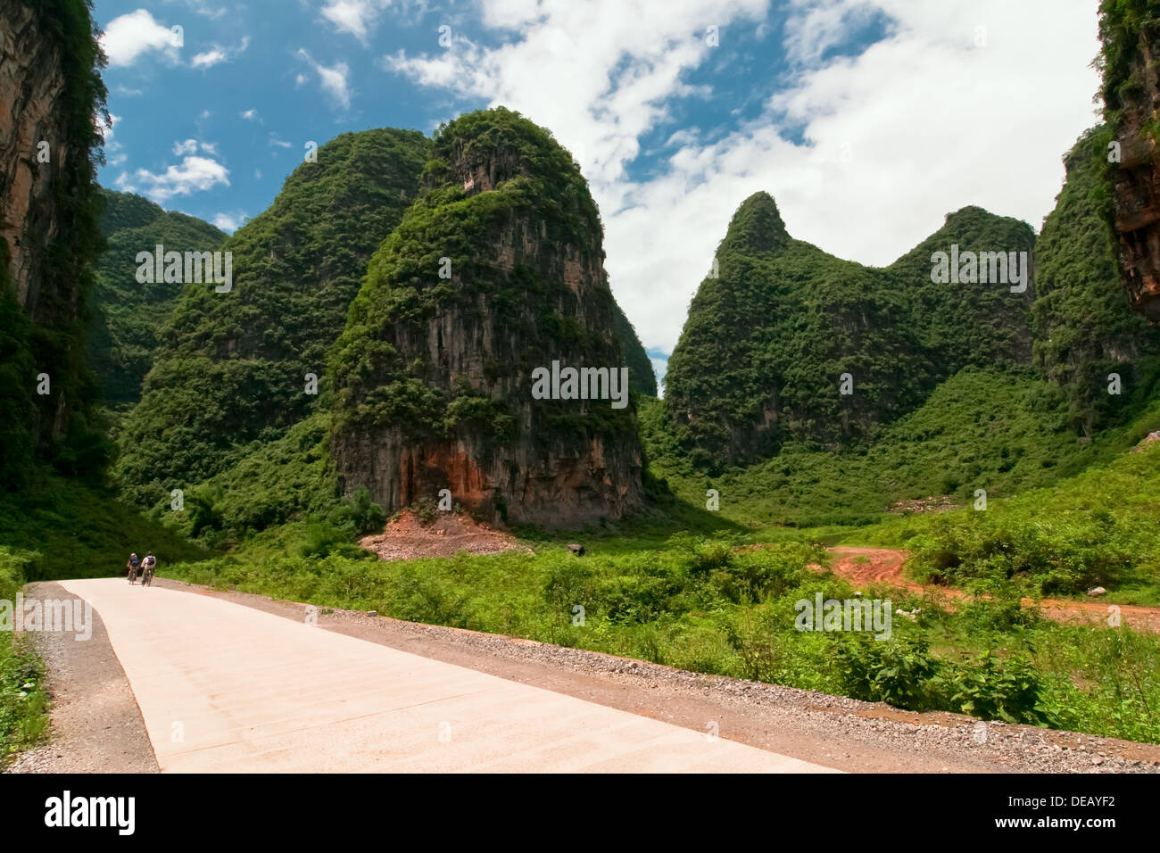 Road through karst limestone mountains in asia Stock Photo - Alamy