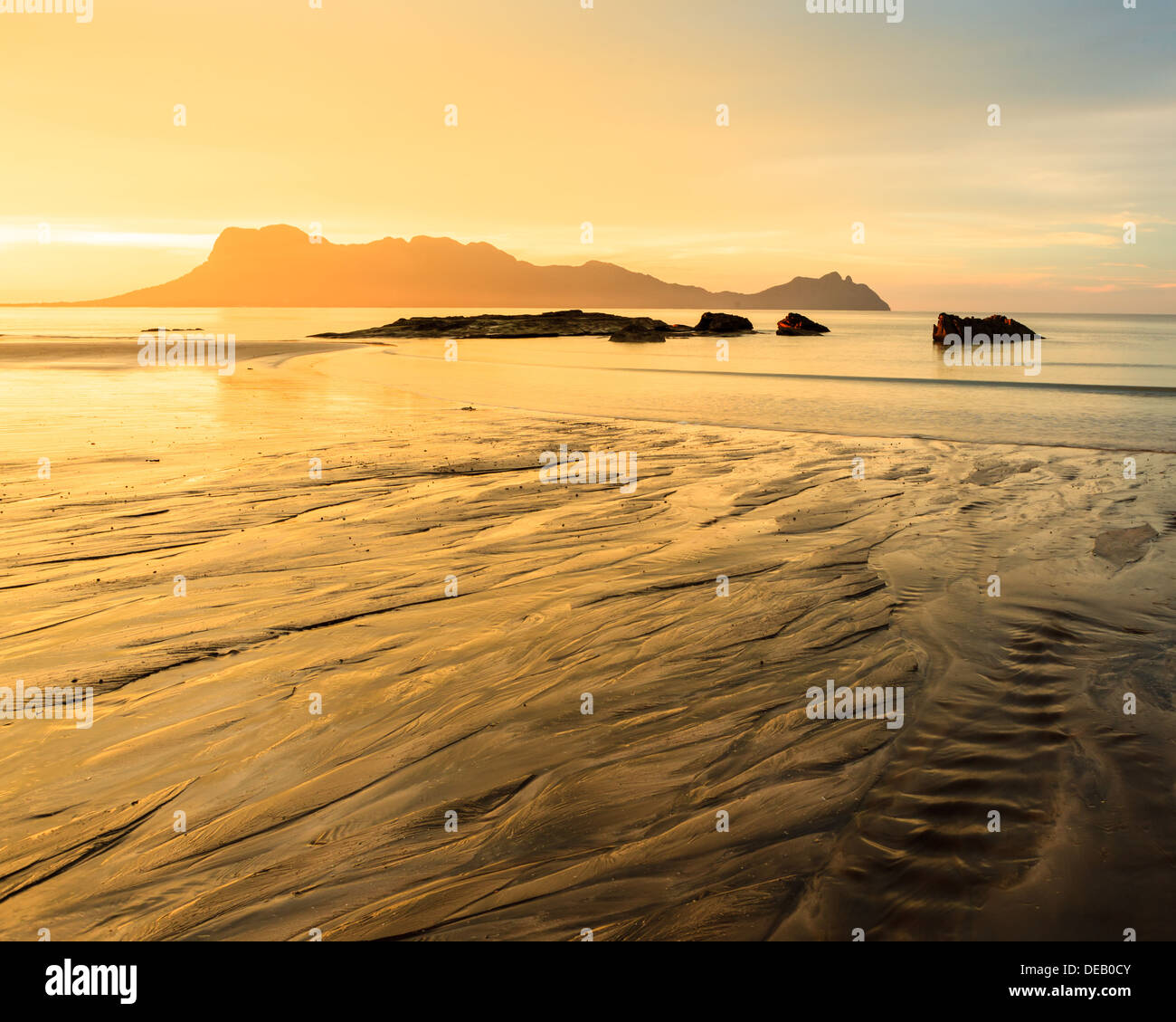 Golden light at beach in asia Stock Photo - Alamy