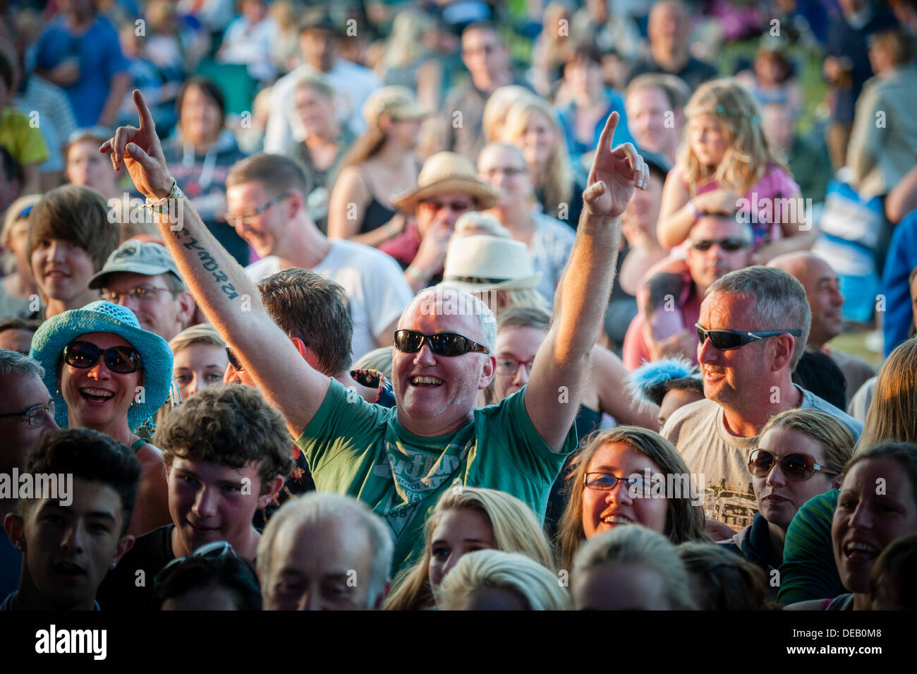 Crowds of happy smiling people enjoying the music at the Big Tribute ...