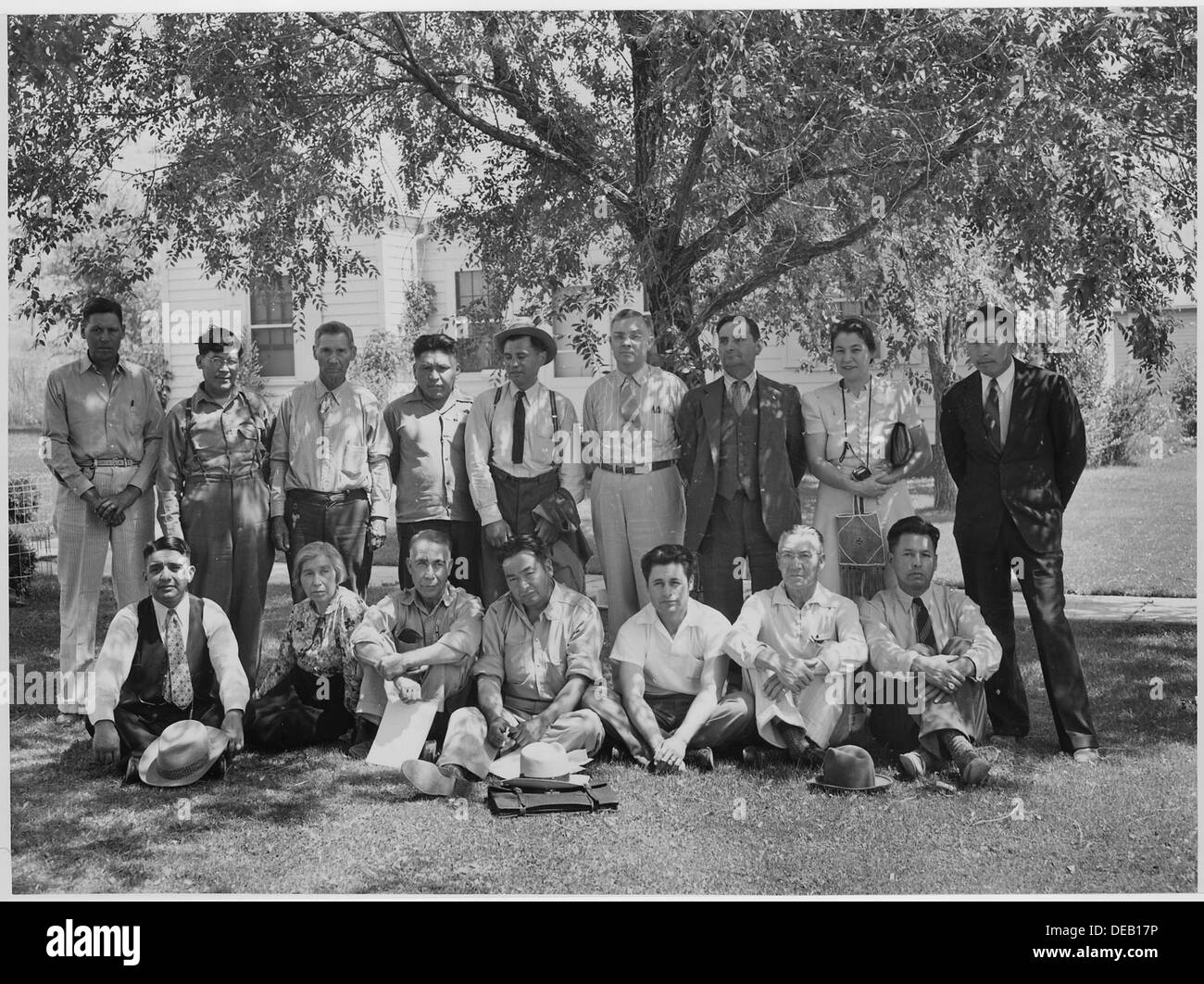 The image shows members of a Tribal Business Council, including Mr ...