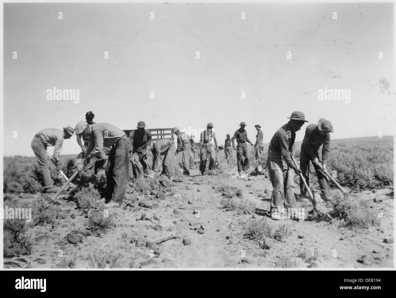 Workers building road in rural Black and White Stock Photos & Images ...
