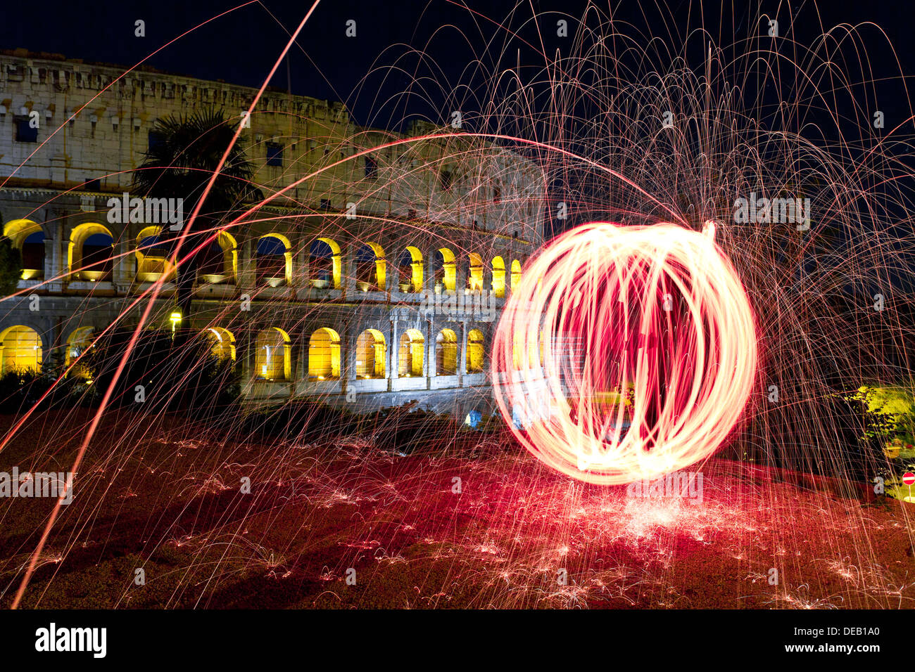 Colosseum illuminated by paintings of light Stock Photo - Alamy