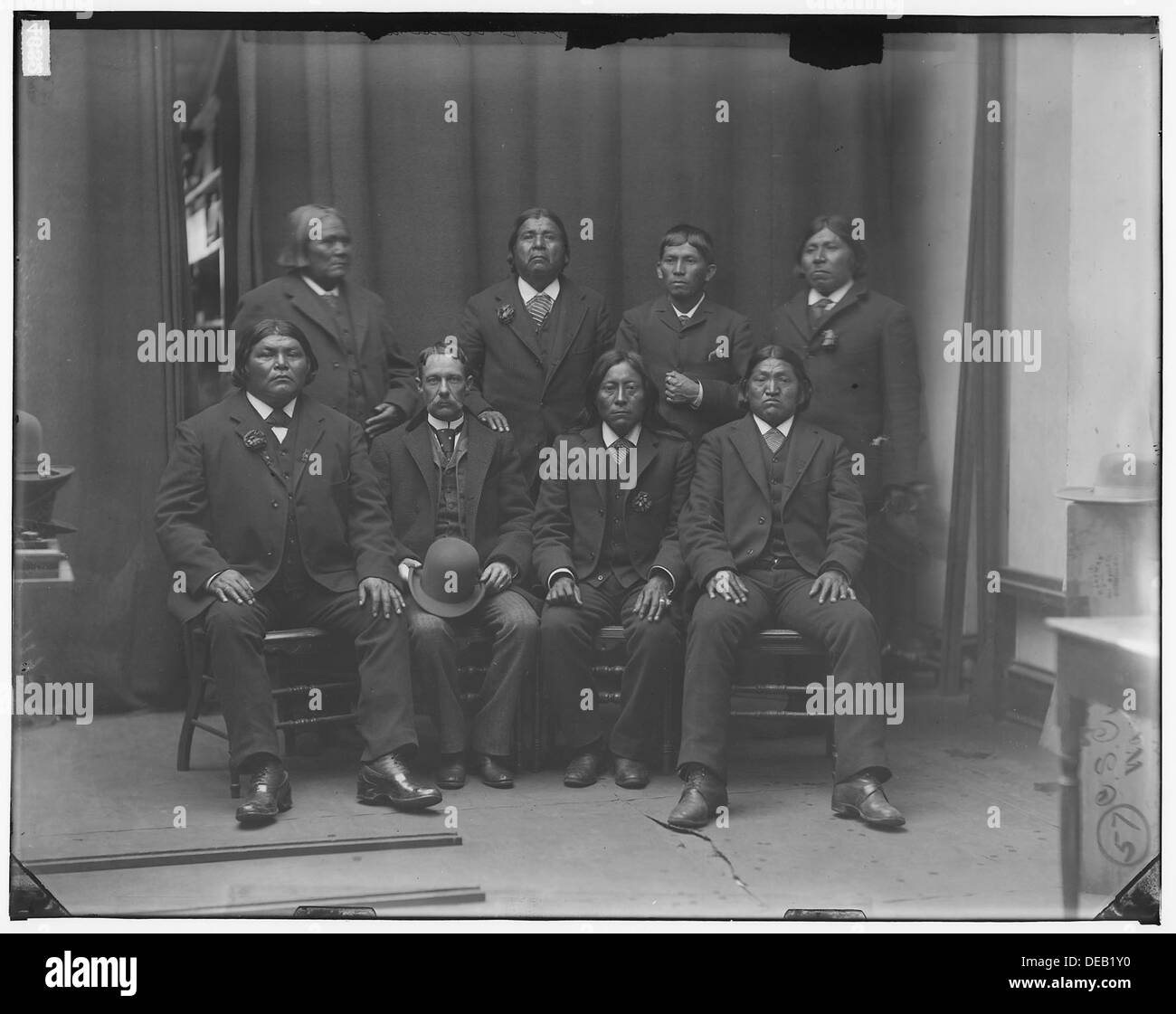This group portrait features members of the Ute tribe, showcasing their ...