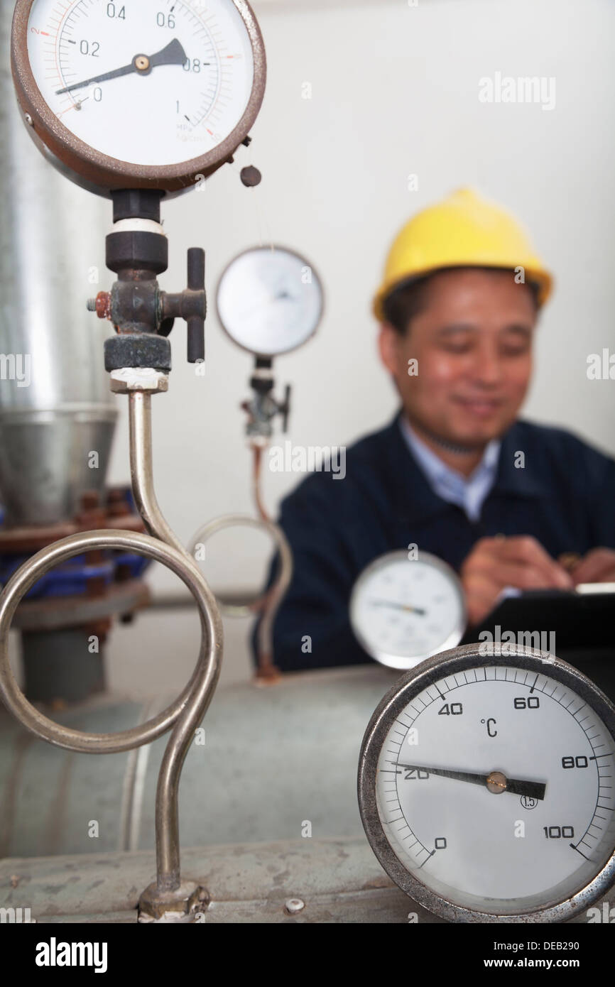 Close up worker factory working gauge hi-res stock photography and ...