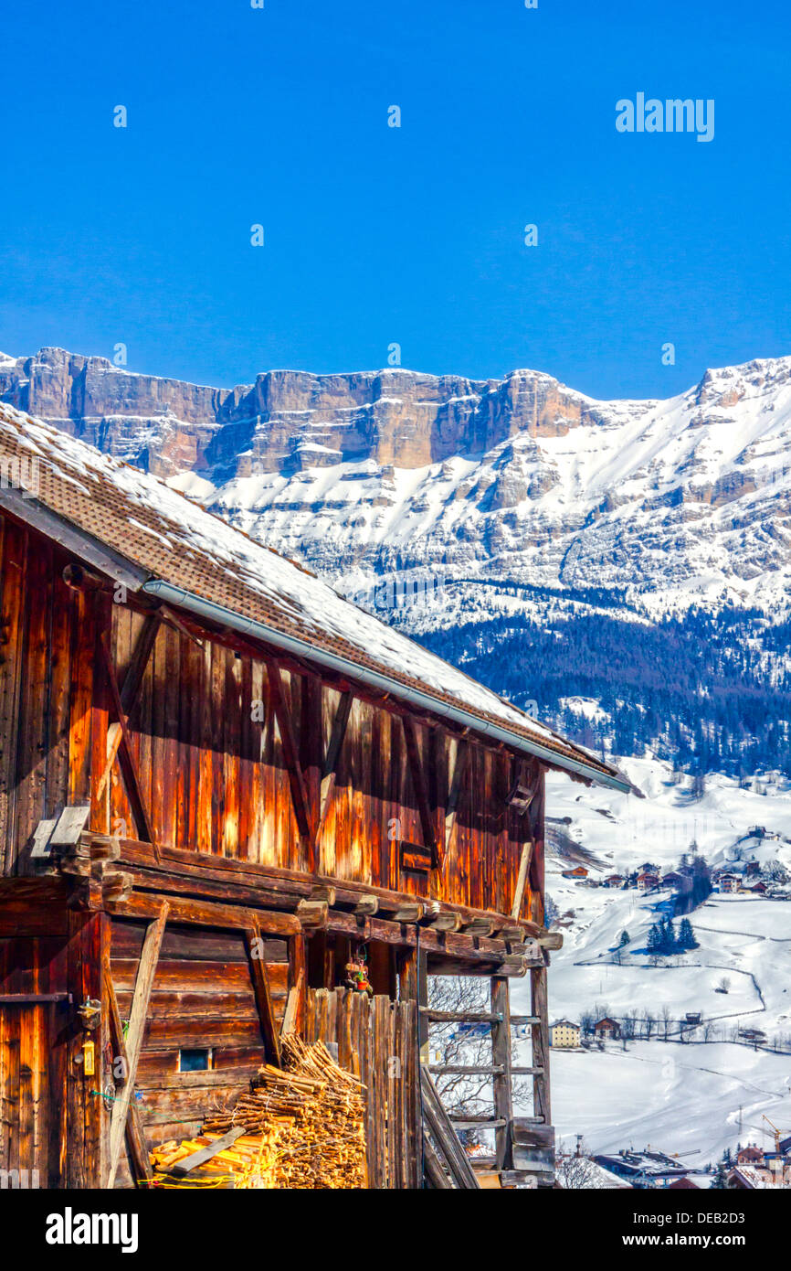 Traditional three storey barn on the old village of La Villa, Italy ...