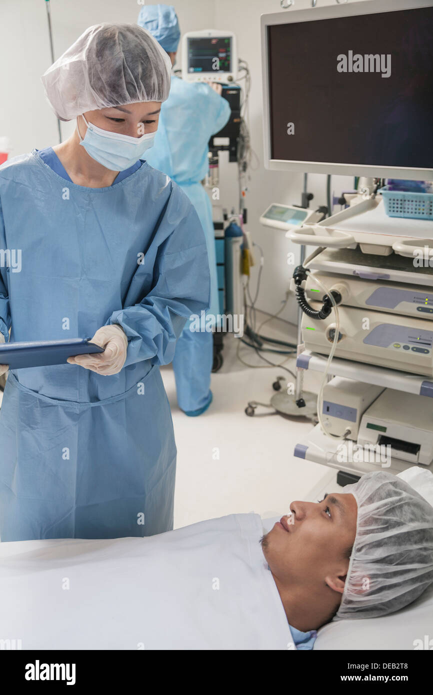 Surgeon consulting a patient, getting ready for surgery Stock Photo - Alamy
