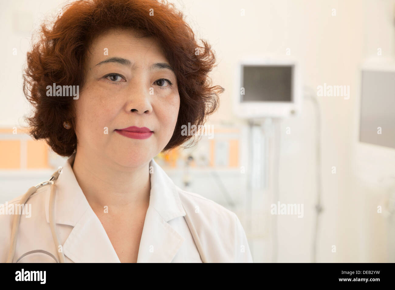 Portrait of serious and confident female doctor Stock Photo - Alamy