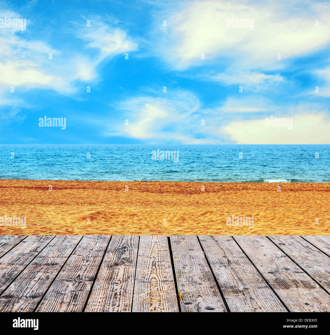 Sandy beach and seascape with wooden floor Stock Photo - Alamy