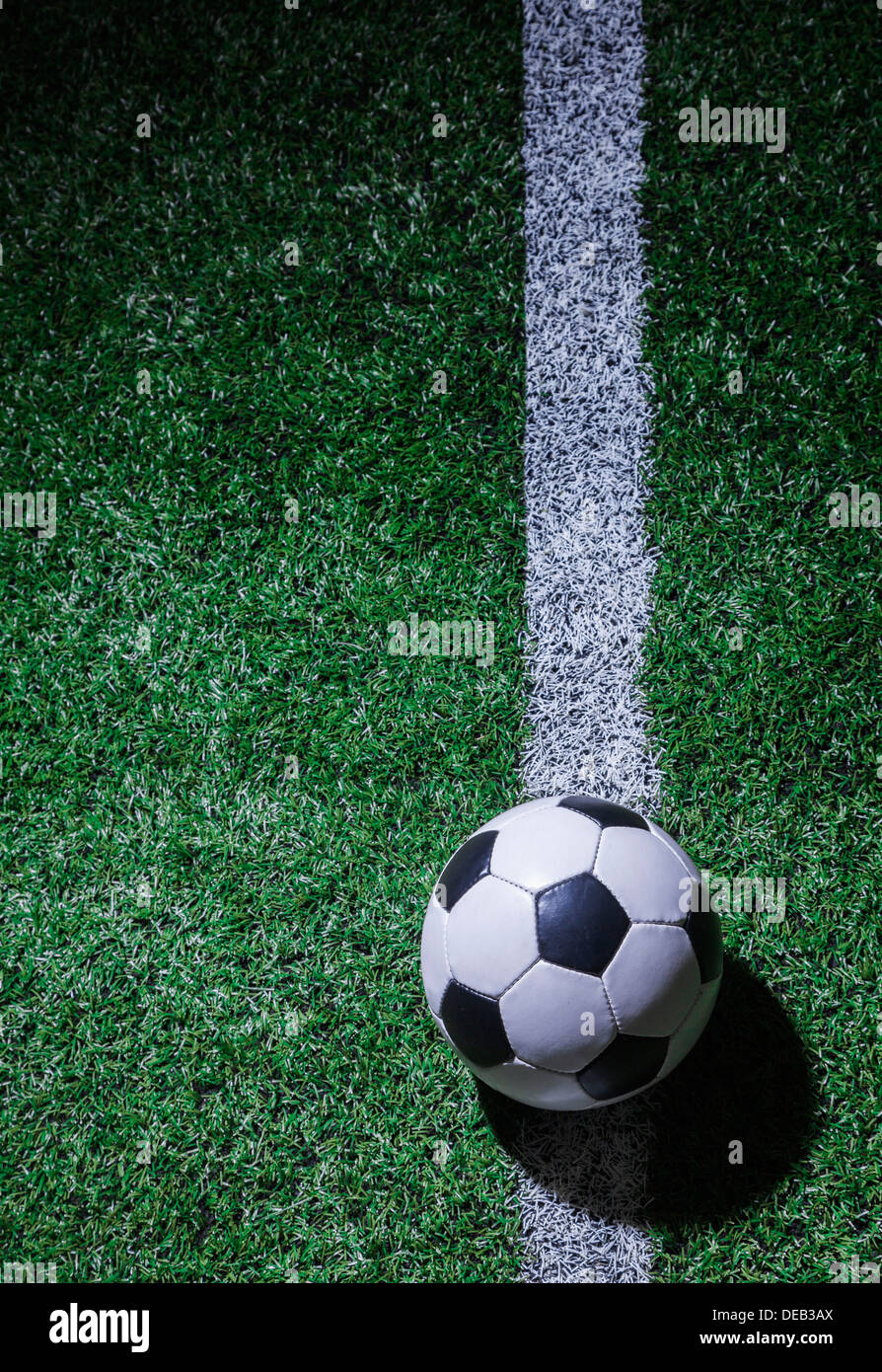 Soccer field with soccer ball and line Stock Photo - Alamy