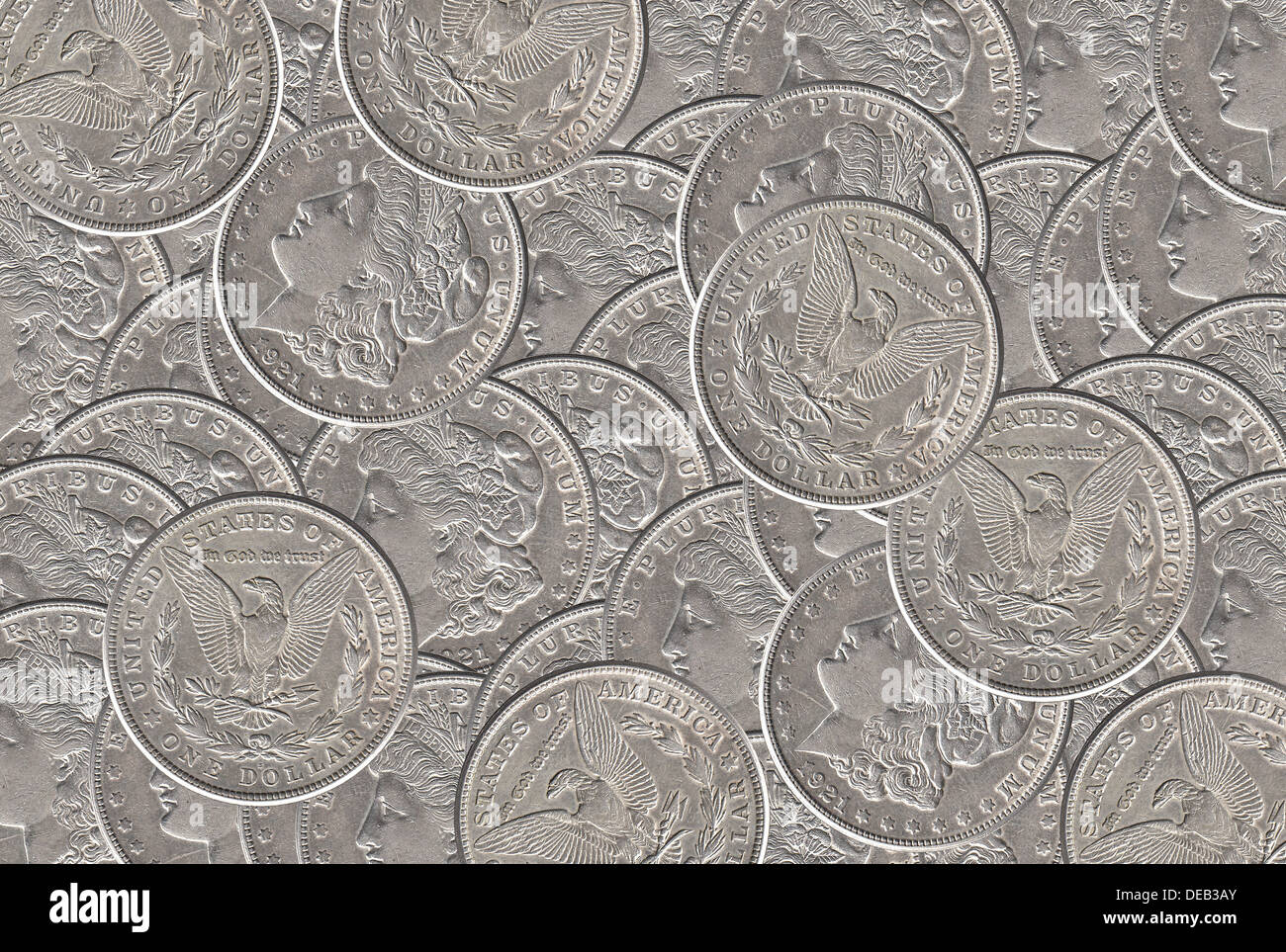 Silver dollar coins background Stock Photo - Alamy